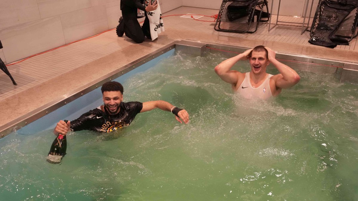 Nikola Jokic tosses Jamal Murray into pool after Nuggets’ NBA Finals ...