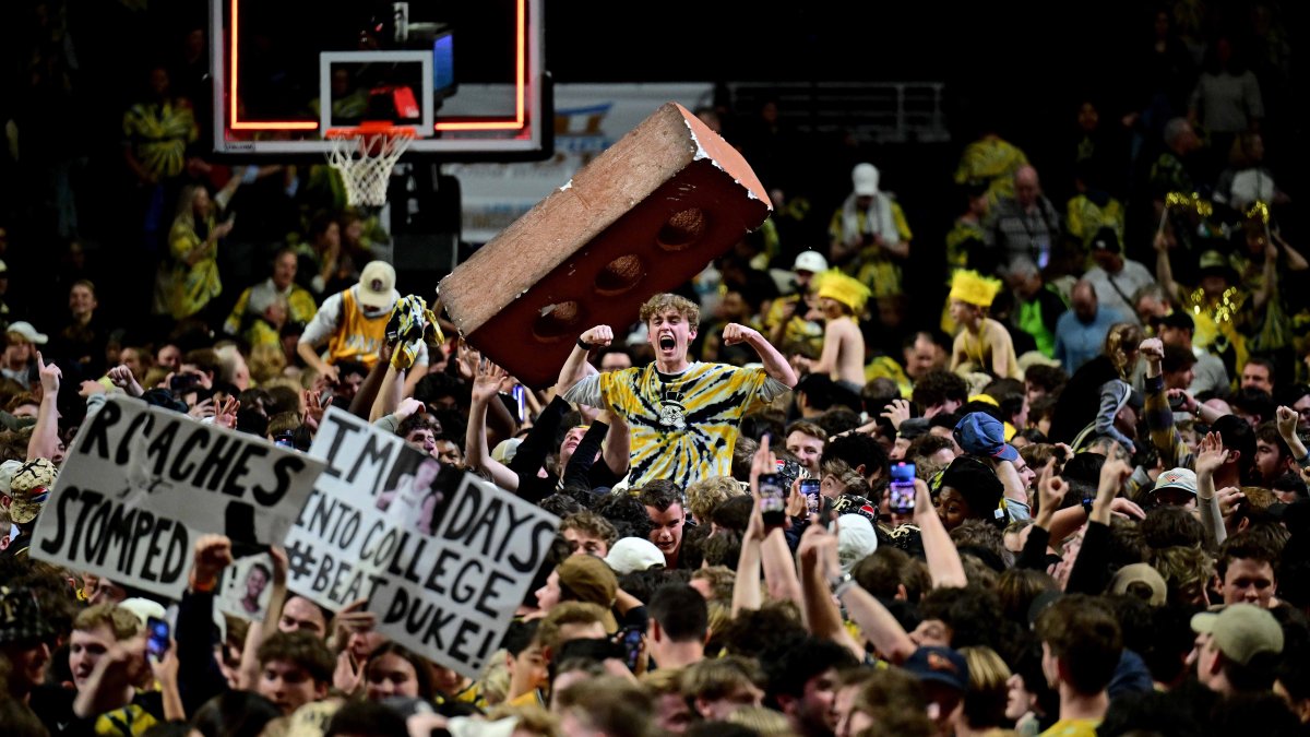 Storm brewing in college basketball: Should fans be banned from rushing ...