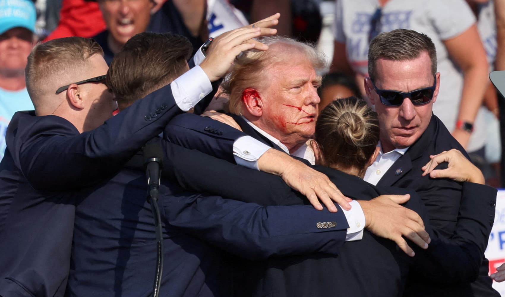 Photos: Former President Donald Trump injured in shooting at rally ...