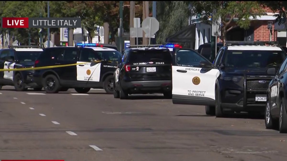 Two dead in Little Italy shooting; officer, suspect shot at 2nd scene ...