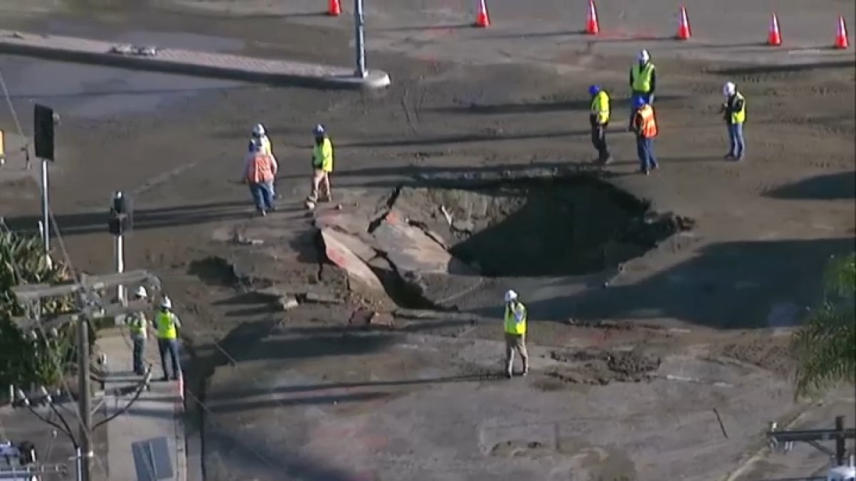Water-main break causes sinkhole on Morena Boulevard, prompting street ...