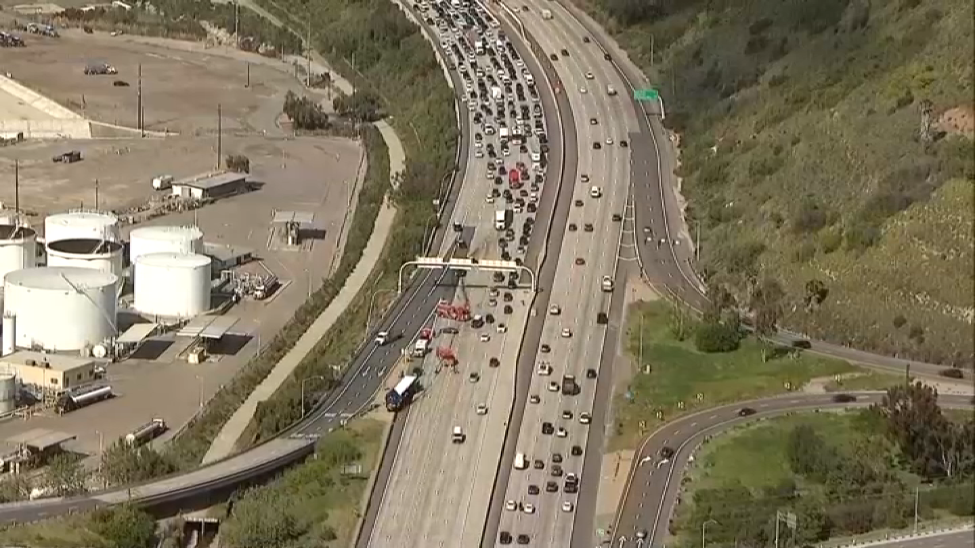 Overturned big rig stalls traffic on I-15 south near Friars Road in San ...