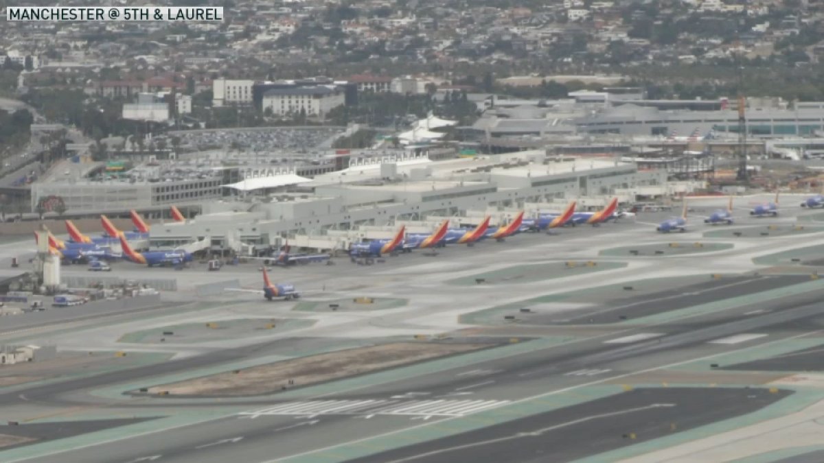 Security alarms triggered at San Diego airport, temporarily causing ...